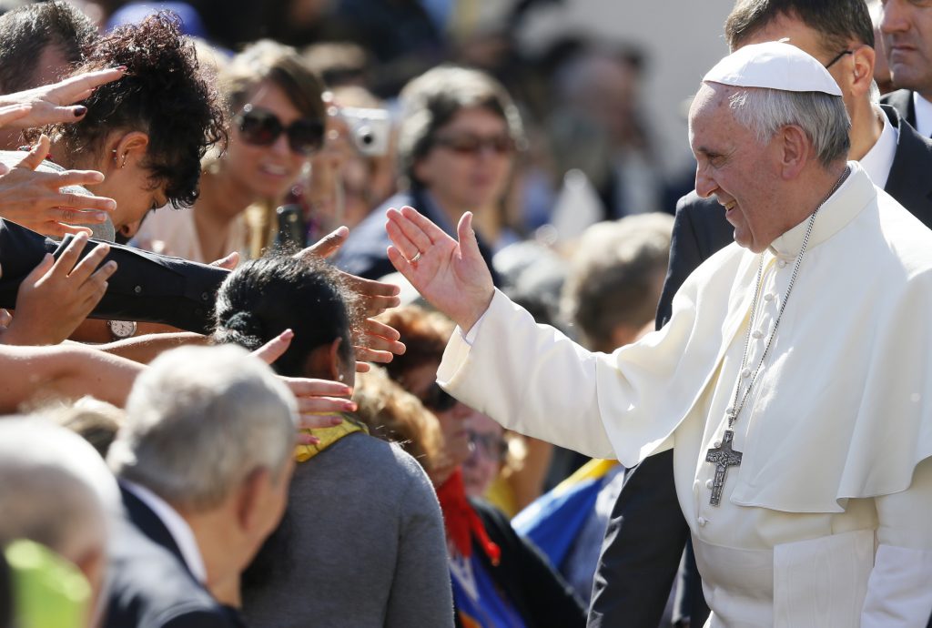 Pope greets crowd during general audience in St. Peter's Square at ...