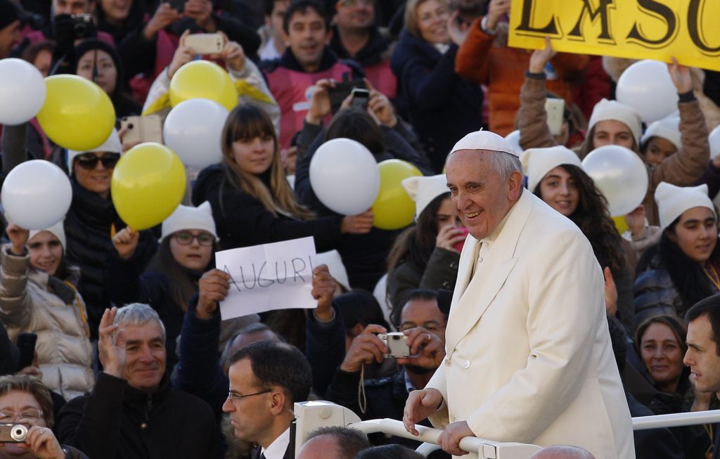 Balloons, sign wish Pope Francis happy birthday as he arrives to lead ...